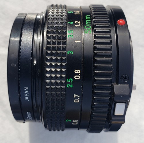 Canon & Promaster Spectrum 7 Lenses 50mm 1:1.8 S.C. Lens & 70-210mm FD ...