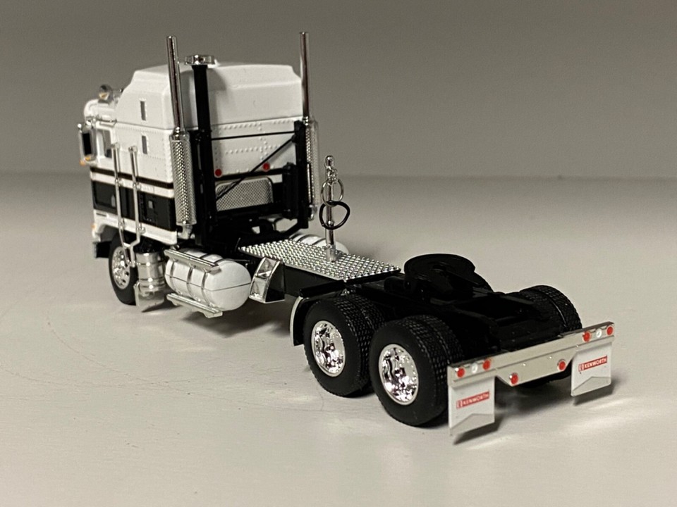DCP 1/64 BLACK & WHITE KENWORTH K100 AERODYNE LONG FRAME W/CAT MOTOR | eBay