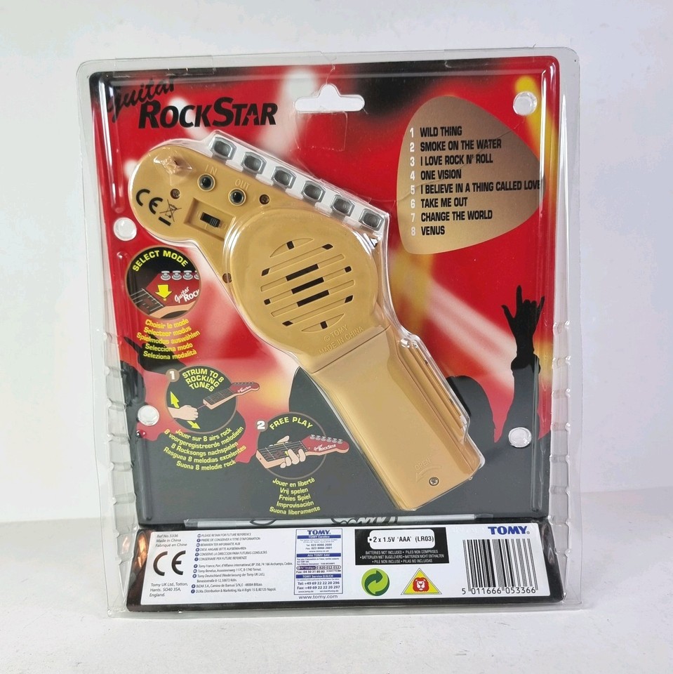 Tomy Guitar Rockstar Electronic Electric Guitar (Red) | eBay Australia
