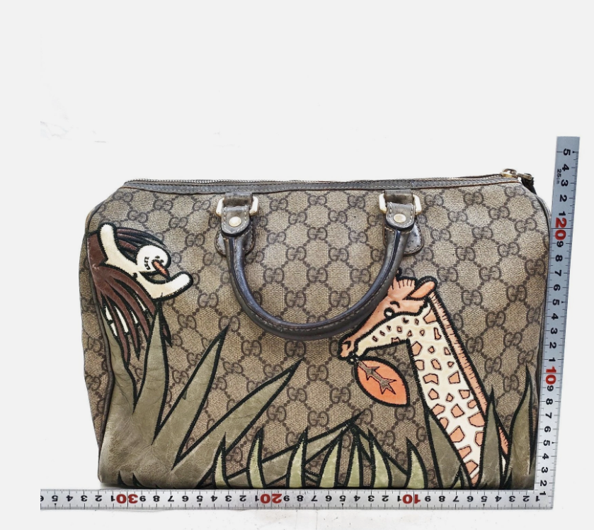 RARE! Gucci Women's GG Supreme Joy Unicef Snowman In Africa Boston ...