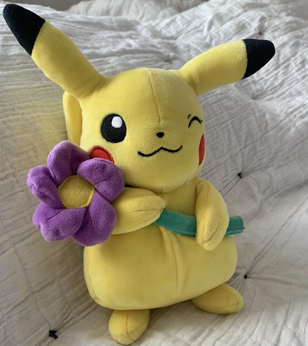 Pikachu Holding A Flower