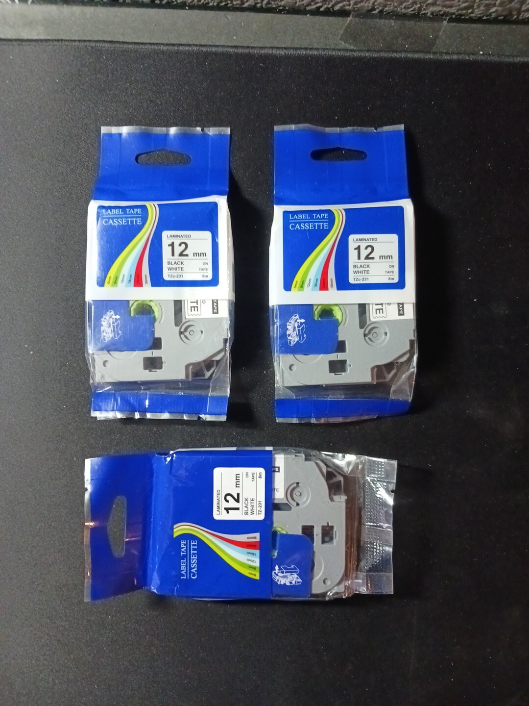 LAMINATED LABEL TAPE CASSETTE 12MM BLACK ON WHITE TAPE TZc-231 SEALED ...