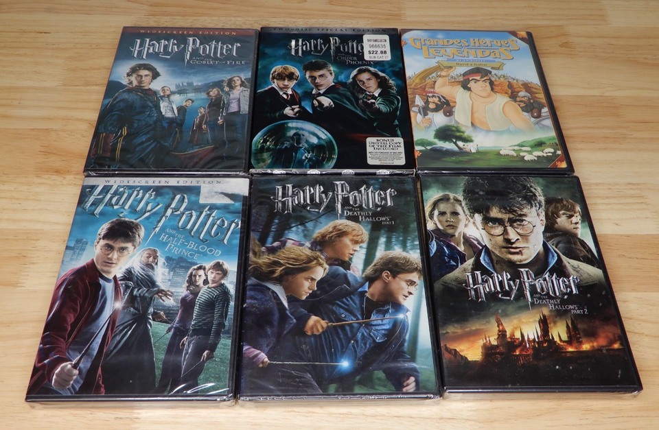 Lot of 40+ Brand New DVDs - Harry Potter, Iron Man, Star Trek, Bond ...