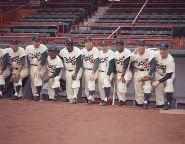 Portrait members Brooklyn Dodgers baseball team pose dugout 1- 1954 Old ...