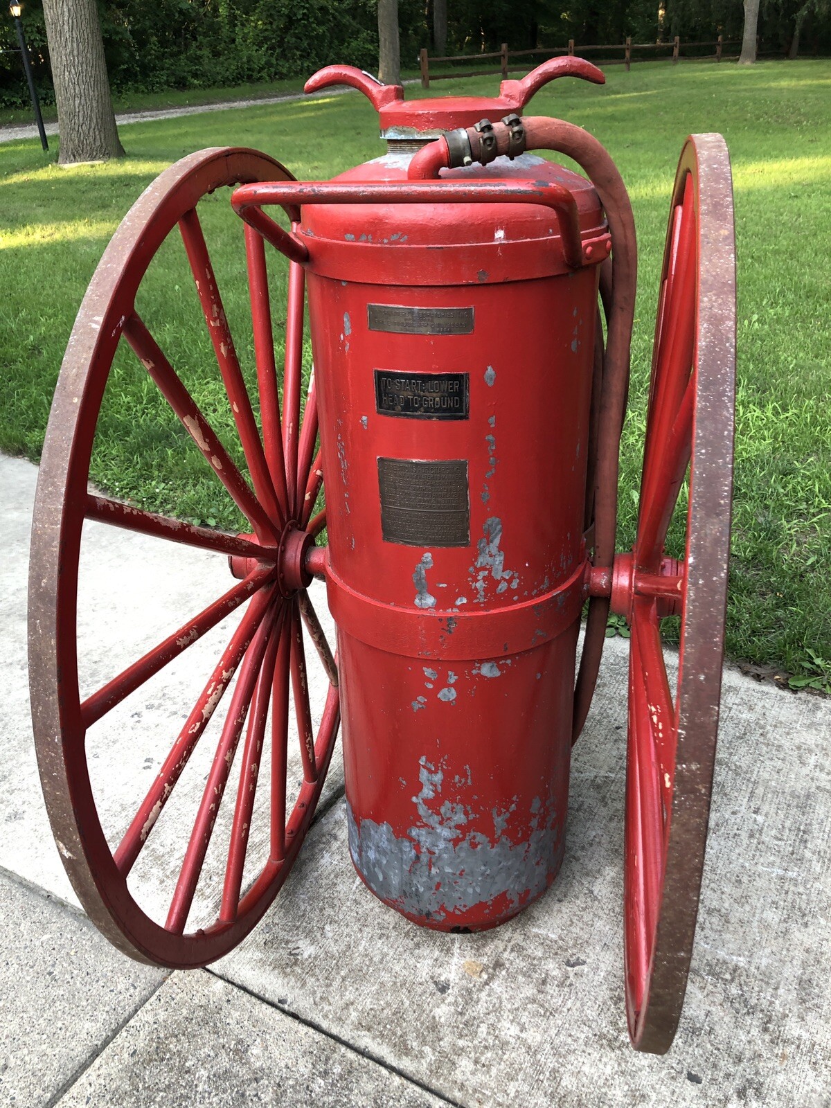 Antique Fire Extinguisher With Wheels