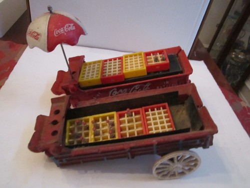 2 ANTIQUE CAST IRON COCA COLA CART SETS - HEAVY - 9" LONG | eBay