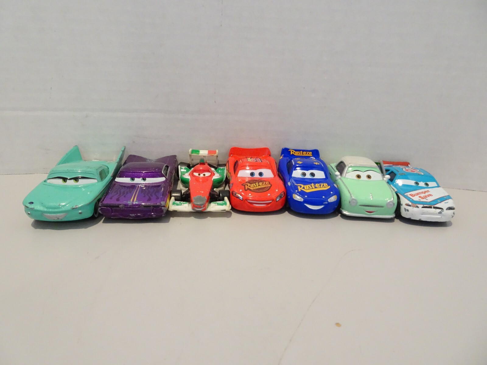 Disney Pixar CARS Lot Of 7 Diecast Vehicles Ramon Flo Lightning McQueen ...