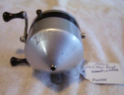 062224 ZEBCO ZERO HOUR BOMB REEL READ TAG VERY NICE TAN SPINNER | eBay