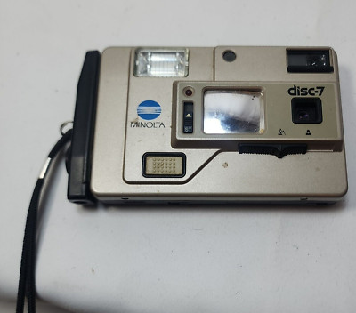 1983 Minolta Disc-7 SELFIE MIRROR Compact Disc Film Camera Untested | eBay