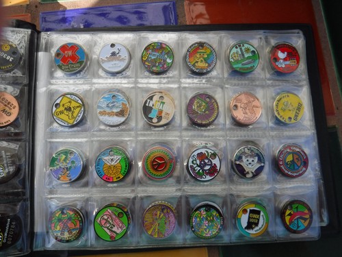 geocaching pathtags & Extazs in a plastic book 10x24 pages with 100 ...