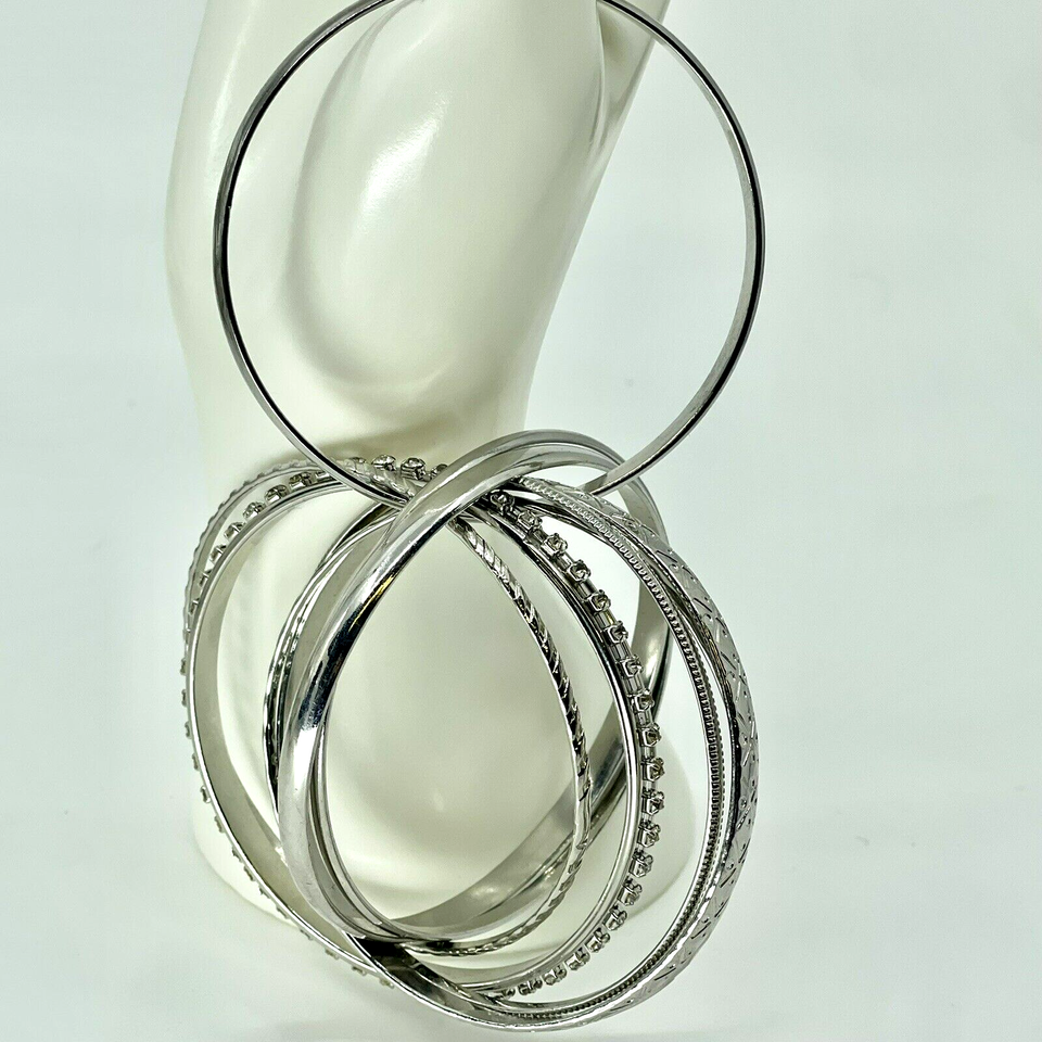 Bangle Bracelets Silver Tone Stack of 8 Connected Nice Bangle Bracelets ...