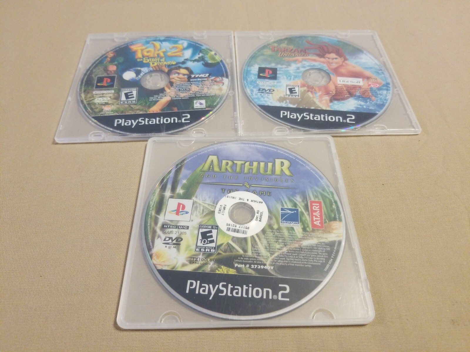 Lot of 3 PS2 Playstation 2 Games Tak 2, Tarzan, and Arthur Discs Only ...