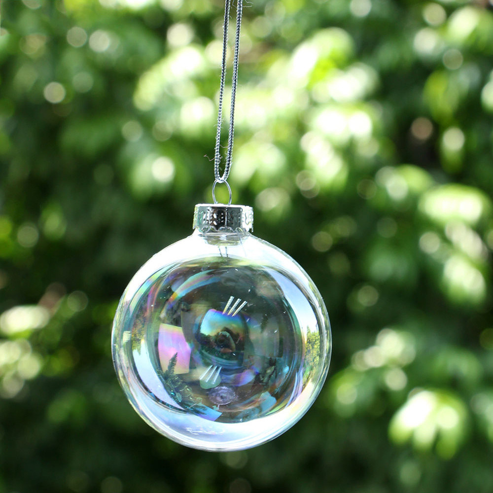 Glass Bubbles For Christmas Dripping In Gold Trimmings And Iridescent