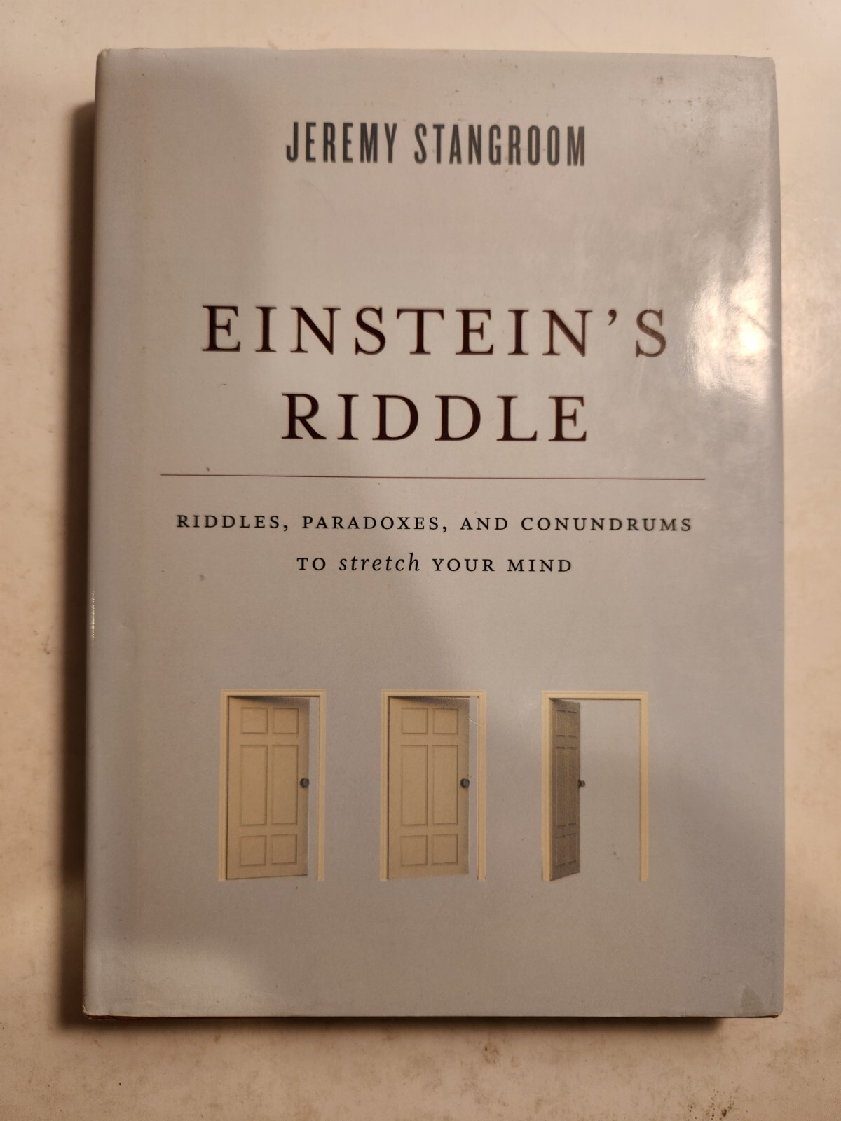 Einstein's Riddle : Riddles, Paradoxes, and Conundrums to Stretch Your ...