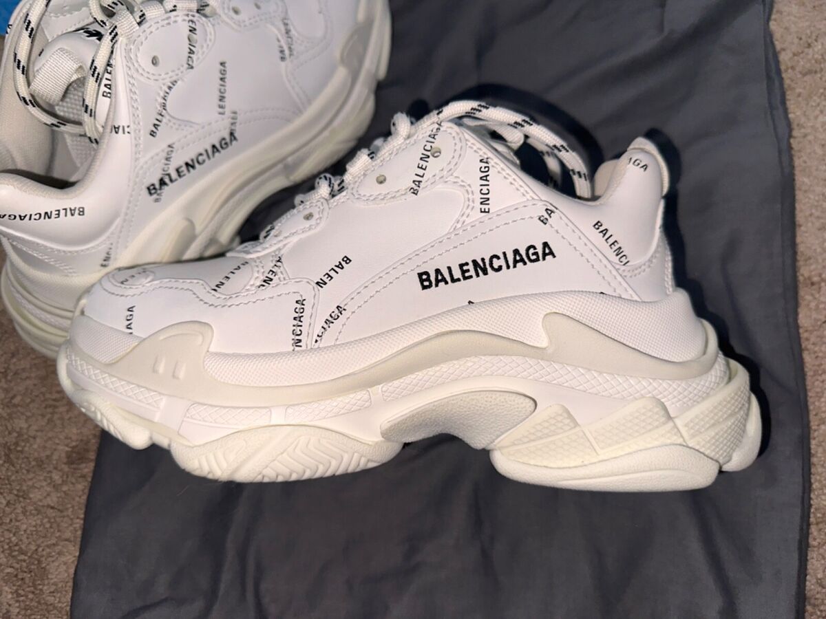 Balenciaga Triple S Sneaker Allover Logo In White/Black Balenciaga Triple S Sneaker Allover Logo In White/Black
