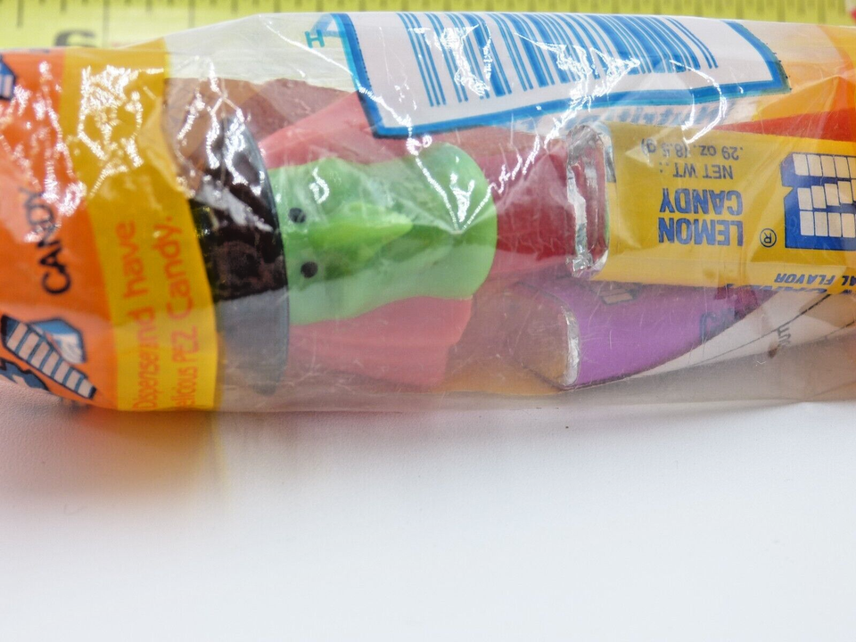 PEZ Witch w/green face & Skull w/purple base + Santa Claus. New in ...