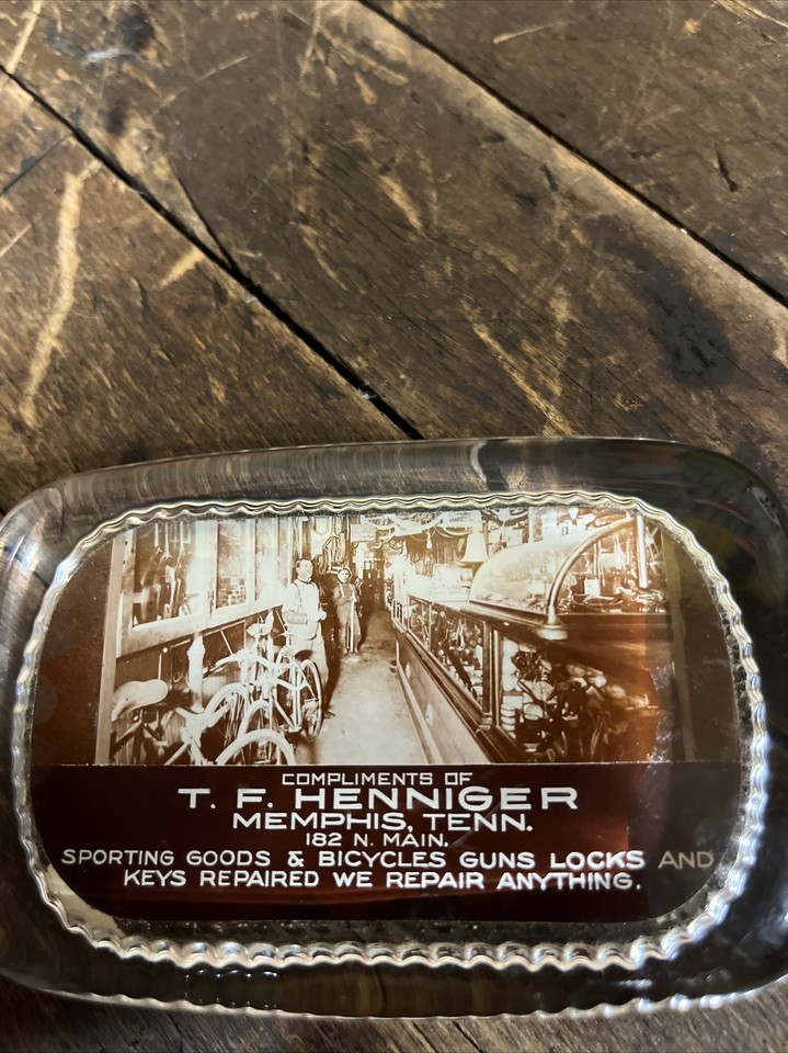VINTAGE T. F. HENNIGER GLASS PAPERWEIGHT SIGN SPORTING GOODS BICYCLES ...