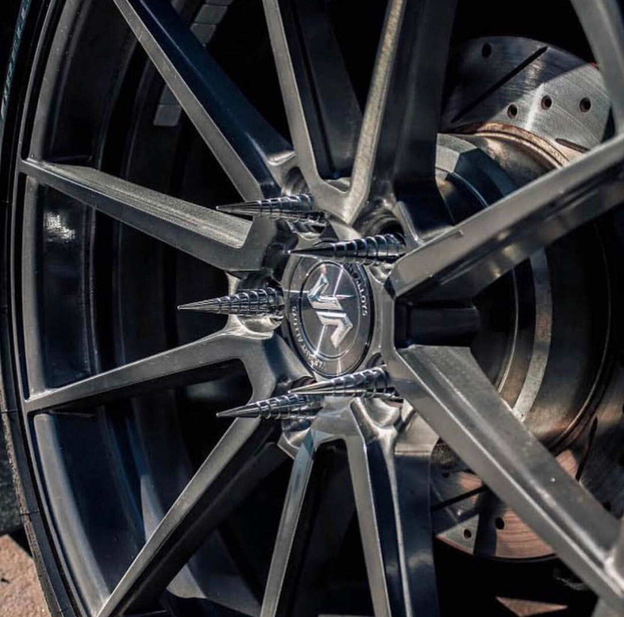 24 TRUE SPIKE 89MM 12X1.25 STEEL LUG NUTS W/ ORANGE EXTENDED SPIRAL ...