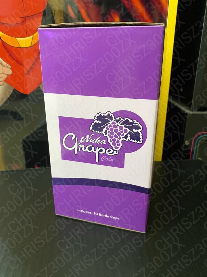 Fallout Nuka Cola Grape Purple Glass Bottle + 10 Caps Tin Rocket Statue ...