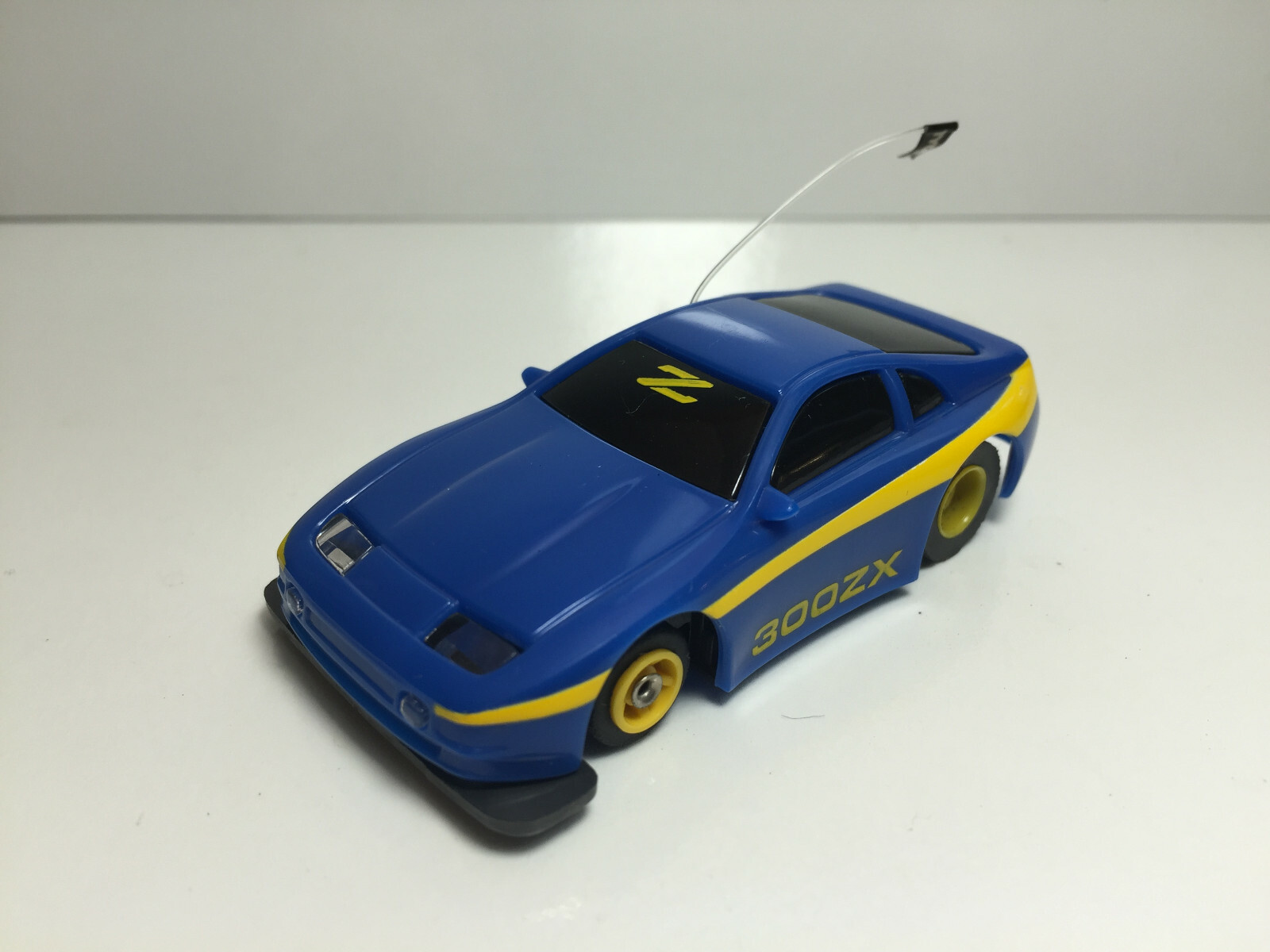 TYCO~NEW~TCR~NISSAN 300 ZX~1993~Slotless~Blue/Yl Aurora Model Motoring ...