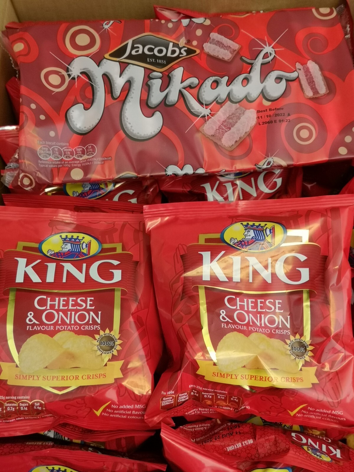 King Crisps 30X25G pack box also a packet of Mikado Biscuits biscuits ...