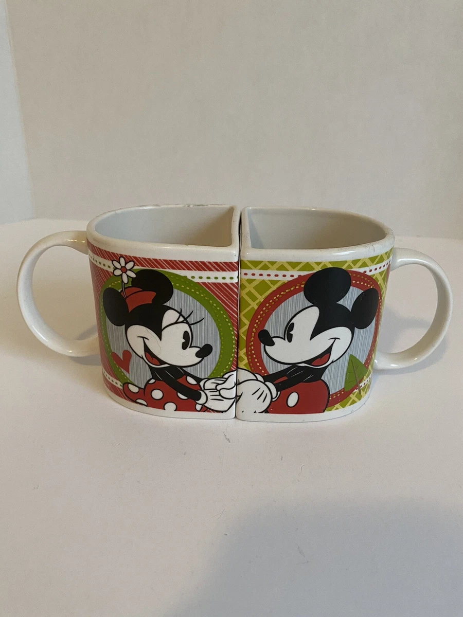 Mickey And Minnie Mouse Holding Hands