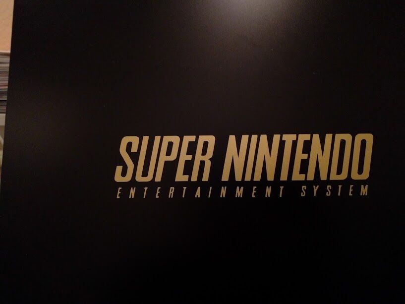 2 pack-SNES Super Nintendo Vinyl Decal Gold Metallic 10" x 2.5" (25cm x ...