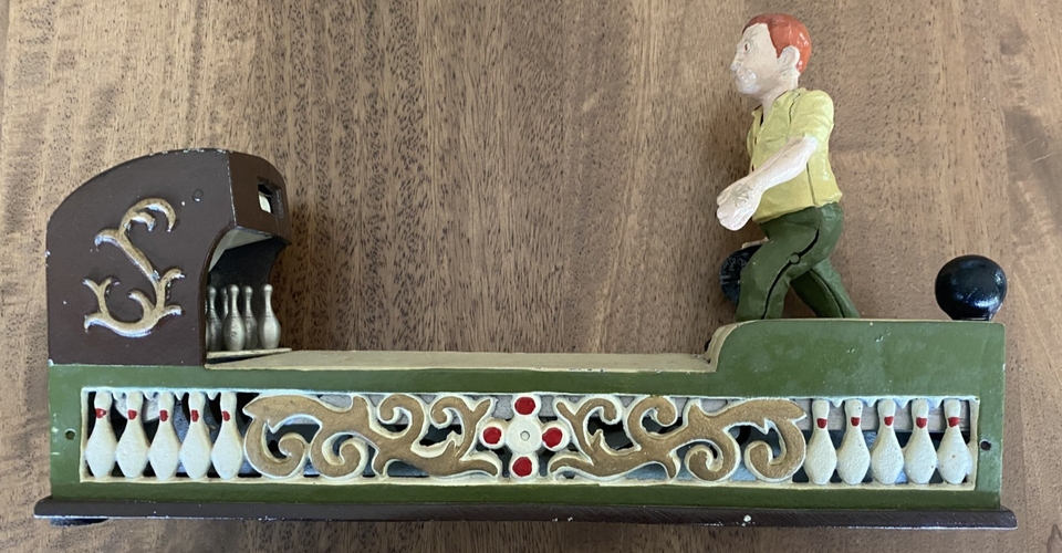 "Strike" cast iron mechanical bank | eBay