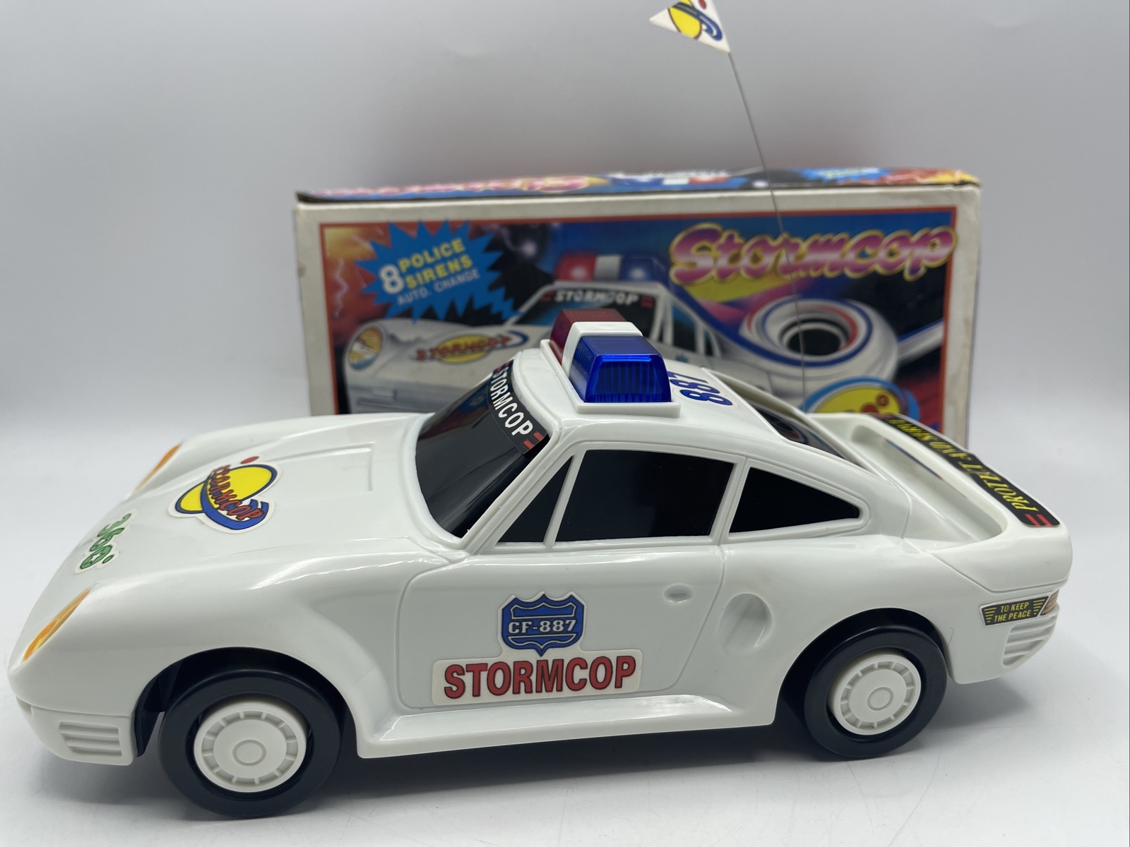 VINTAGE CHAIN FONG TOYS COSMOCOP ANIMATED TOY BUMP AND GO POLICE CAR ...