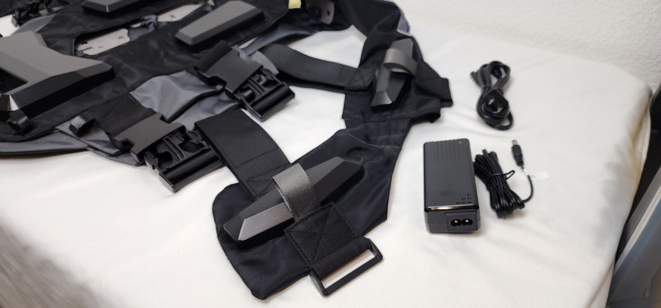 Hardlight VR Suit - Haptic Feedback Motion Tacking Jacket Virtual ...