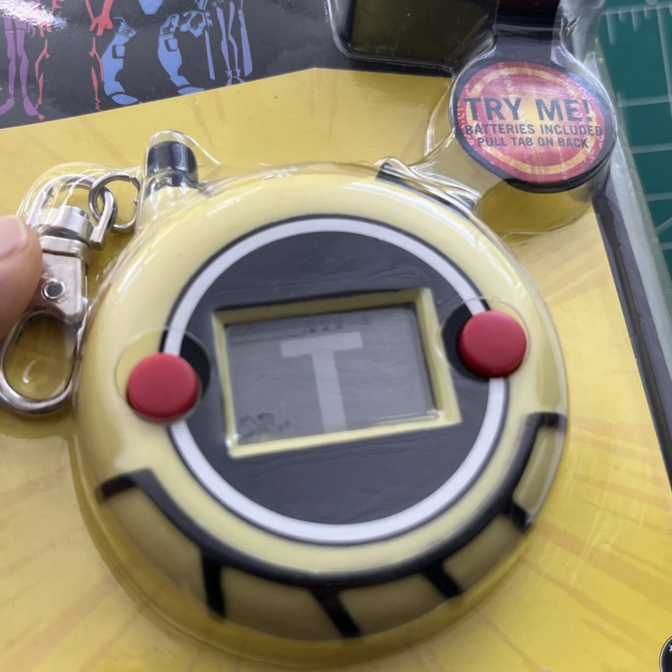 Teen Titans Techno Source 2005 Keychain Handheld LCD Video Game Pizza Catch | eBay