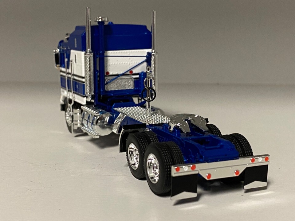 DCP 1/64 BLUE & WHITE KENWORTH K100 AERODYNE LONG FRAME W/CAT MOTOR | eBay