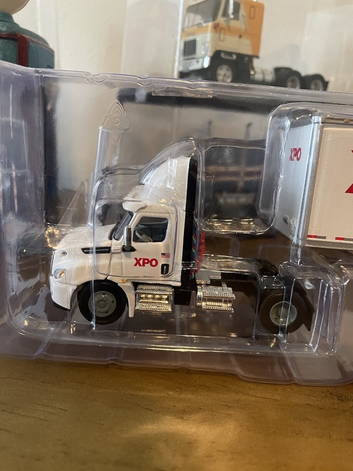 DCP by First Great 1:64 XPO LOGISTICS Freightliner w/pup trailers. U.S ...