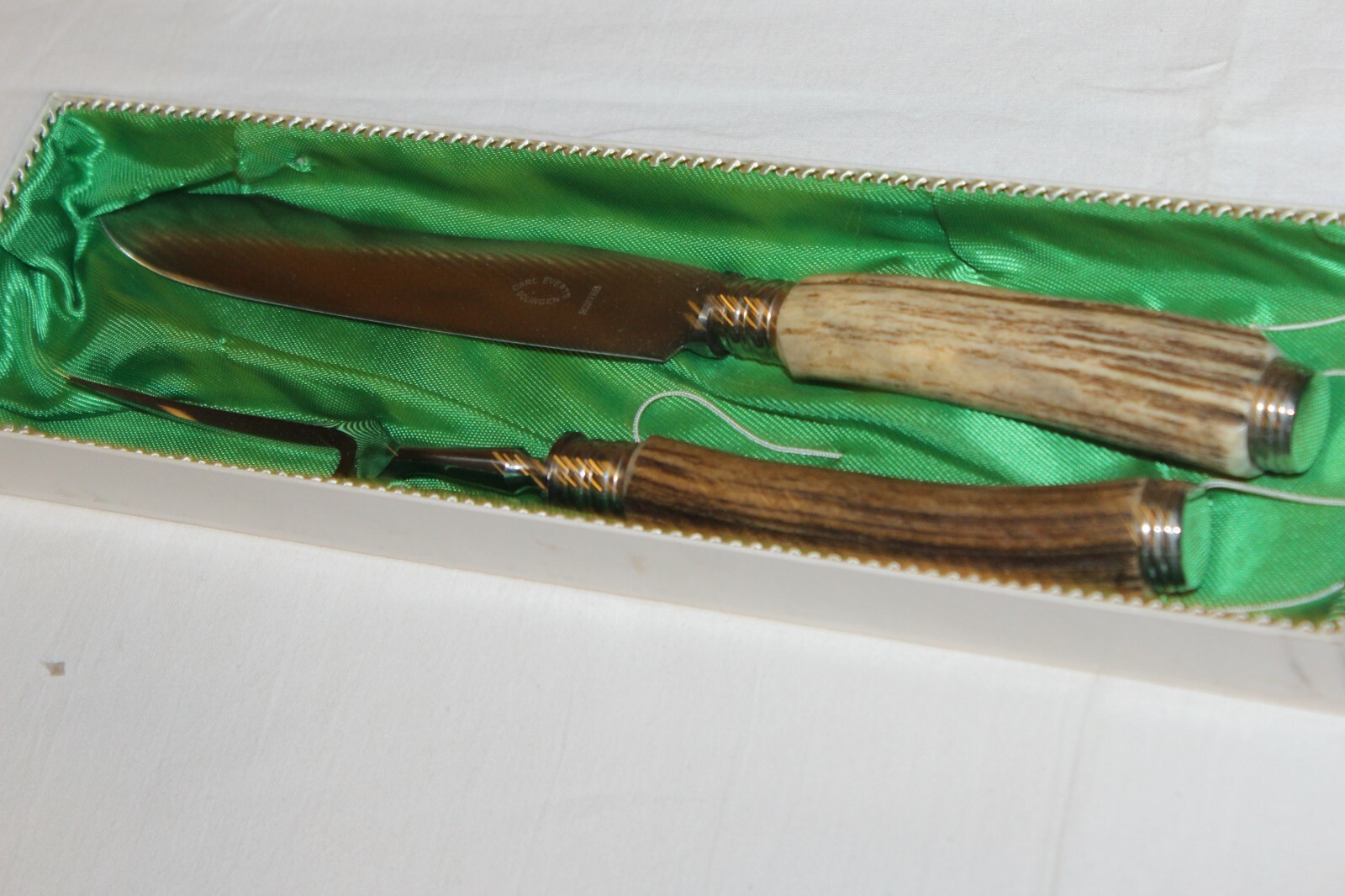 2 tlg. Tranchierbesteck von Carl Everts Solingen. Horngriff. geätzt ...