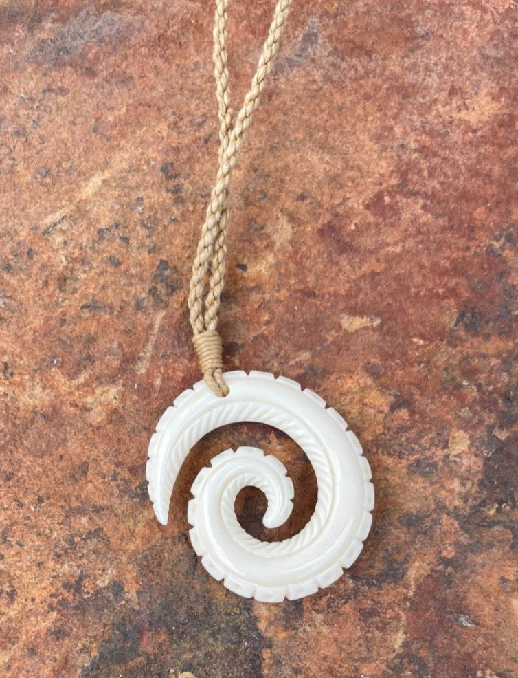 Hand Carved Bone Pendants