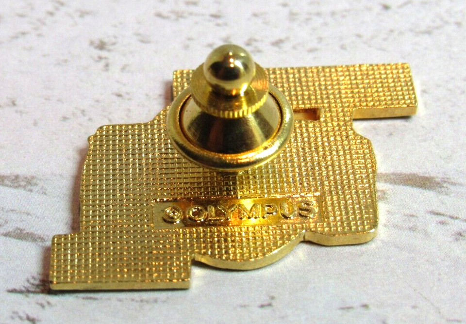 Olympus camera OM77AF collectible pin new-Olympus logo on back embossed ...