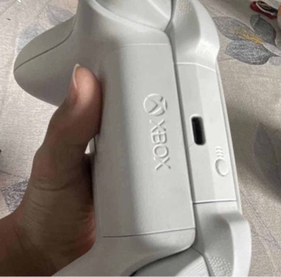 2 Xbox series S controllers. White one has stick drift. Red one has ...