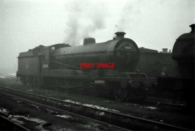 PHOTO LNER ROBINSON O4/7 2-8-0 63634 IS SEEN AT A SNOWY LANGWITH ...