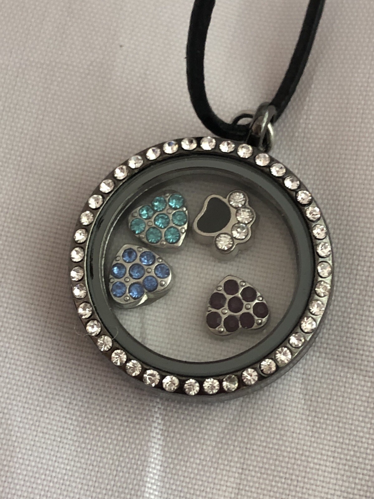 MODERN LOCKET PUPPY DOG PAW PRINT AND HEARTS NECKLACE… - Gem