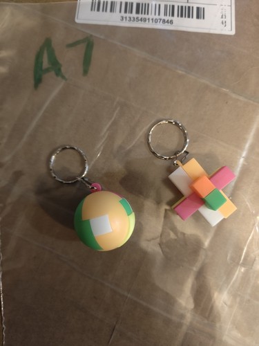 XX- 2 Puzzle Ball Keychain Plastic Neon Colored Puzzle Piece Circle ...