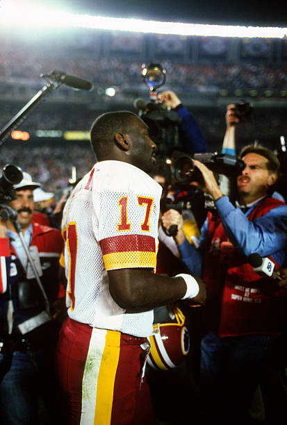 Doug Williams Washington Redskins walks off the field after Football ...