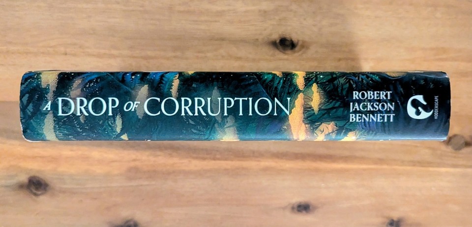 A Drop of Corruption by Robert Jackson Bennett Hardback | eBay UK