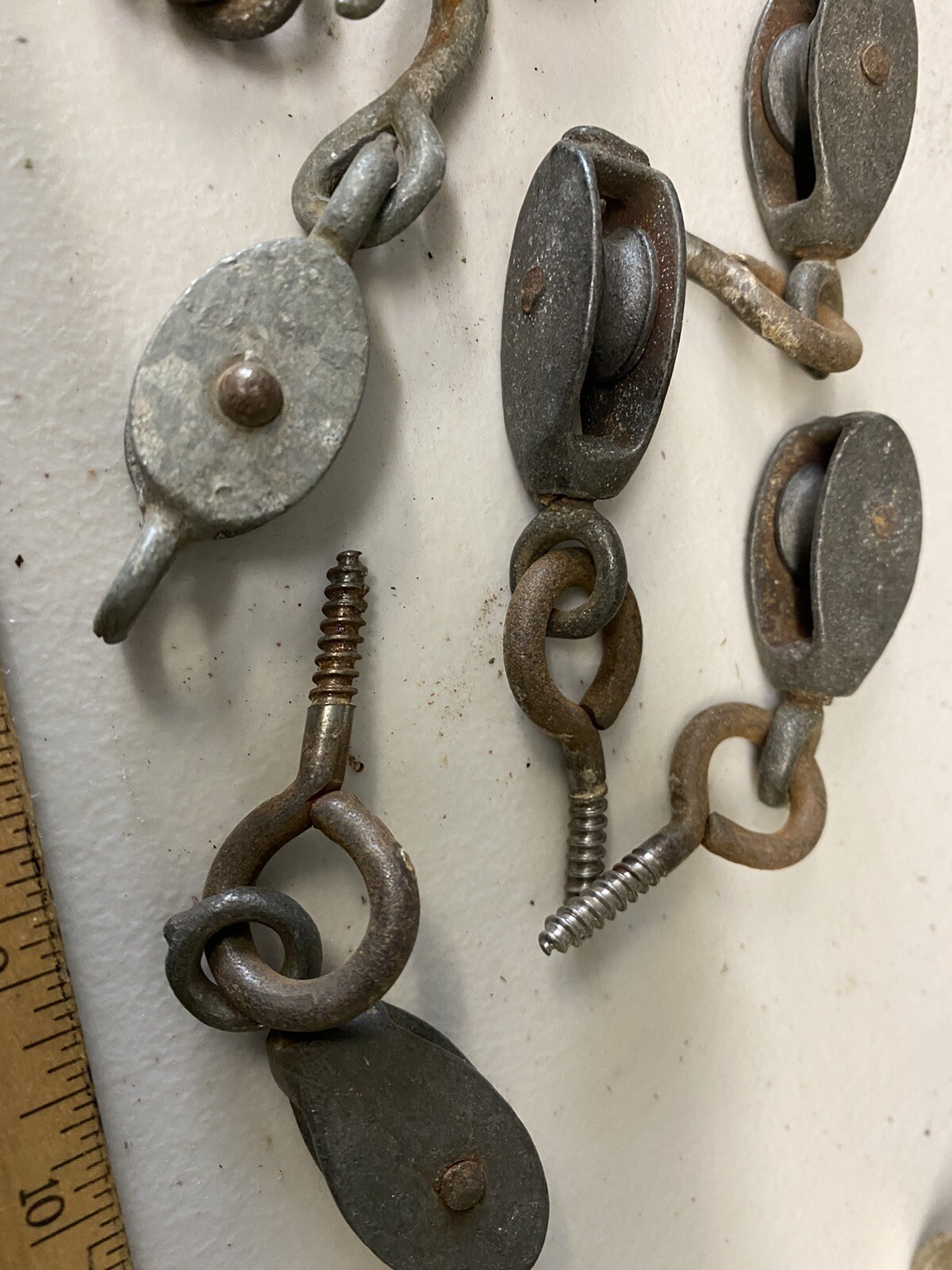 ANTIQUE VINTAGE LOT OF 8 MINIATURE PULLEYS WITH SCREW HOOKS MEASURES 1. ...