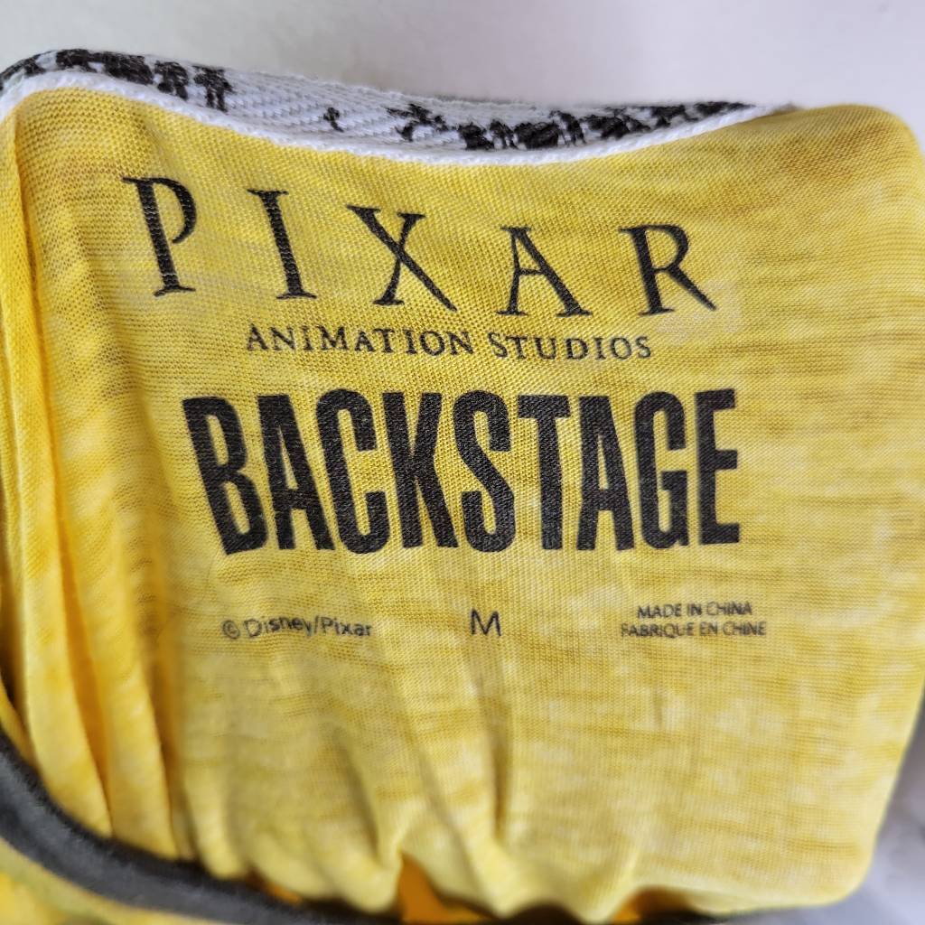 Disney Pixar Backstage Yellow Woody Toy Story T-Shirt… - Gem
