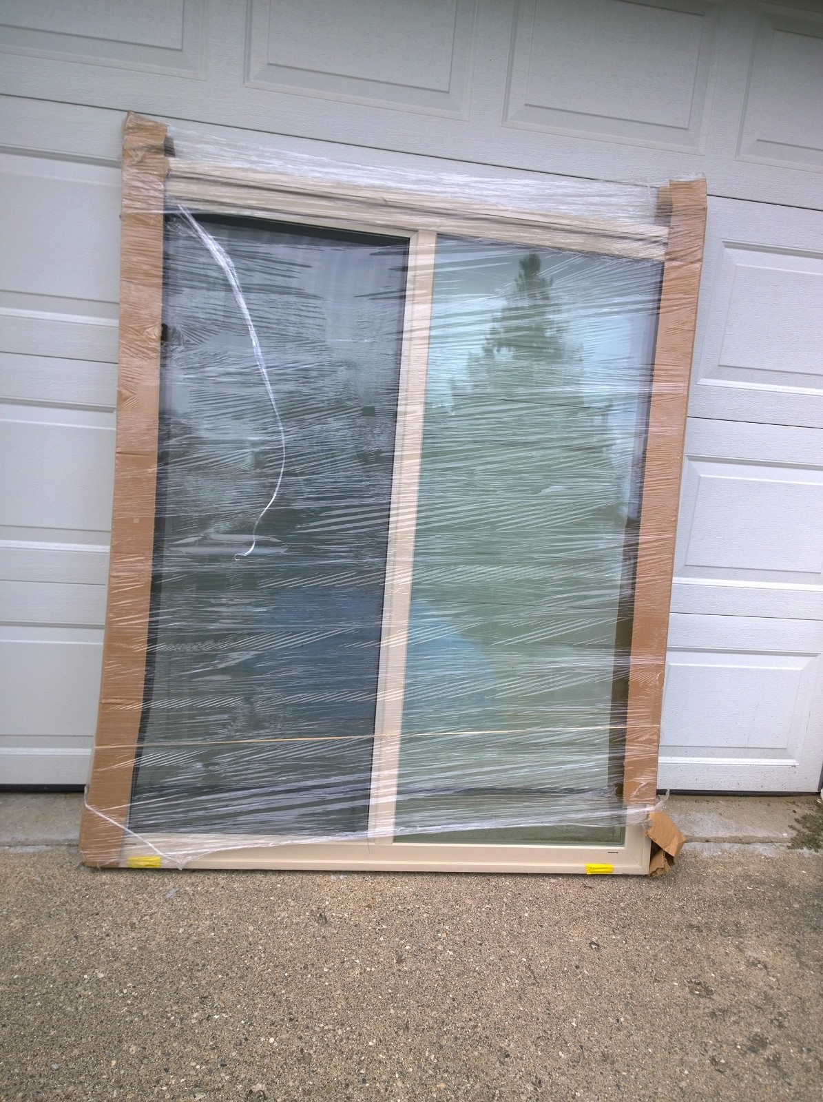 BRAND NEW: ReliaBilt Almond-Color VINYL Home SEMI-SLIDER WINDOW (52"W x ...