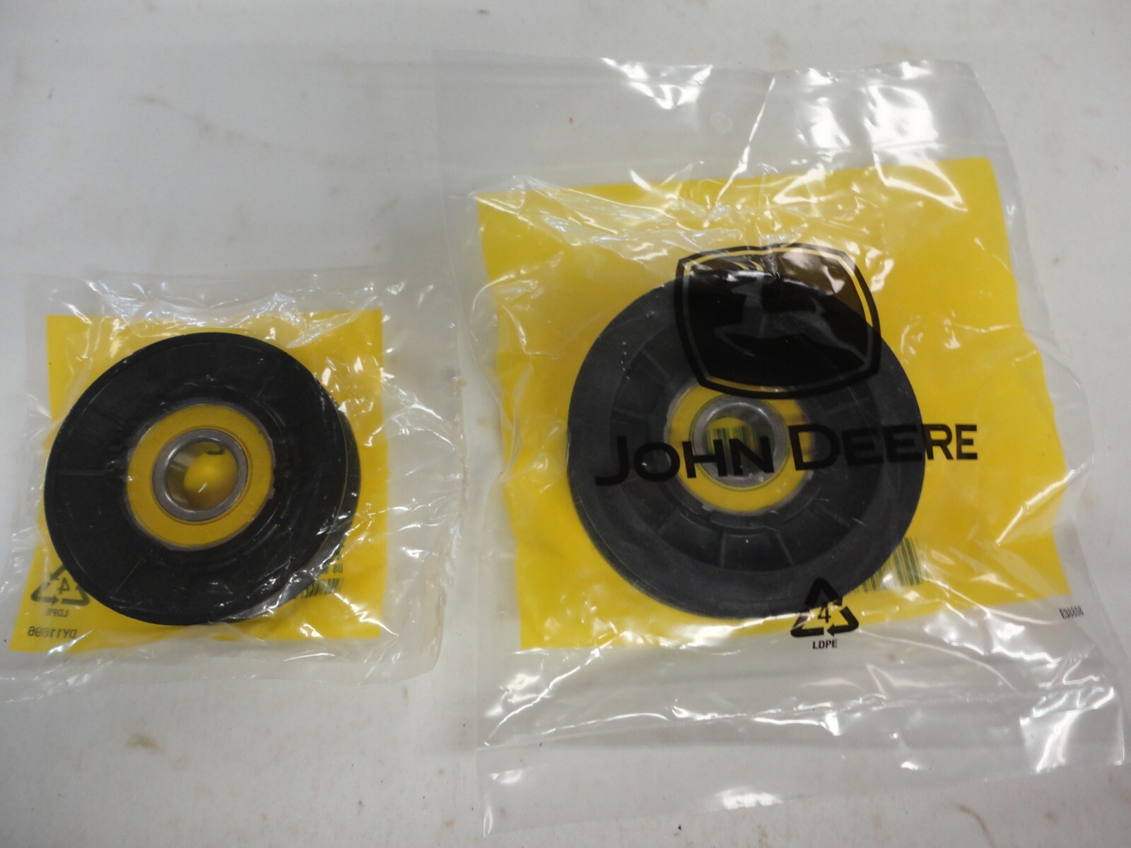 JOHN DEERE Genuine OEM Idler Pulley kit GX20286 GX20287 for ...