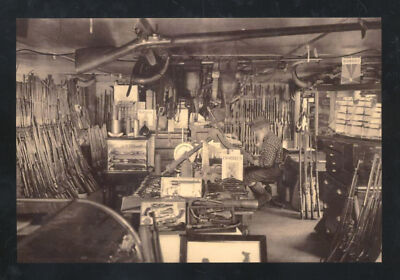 REAL PHOTO NORTH WOODSTOCK NEW HAMPSHIRE GUN SHOP INTERIOR POSTCARD ...
