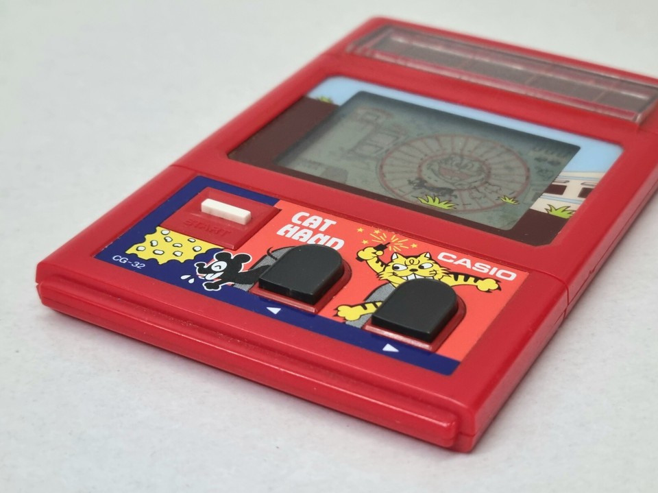 Casio CAT HAND CG-32 LCD electronic handheld game and watch TESTED ...