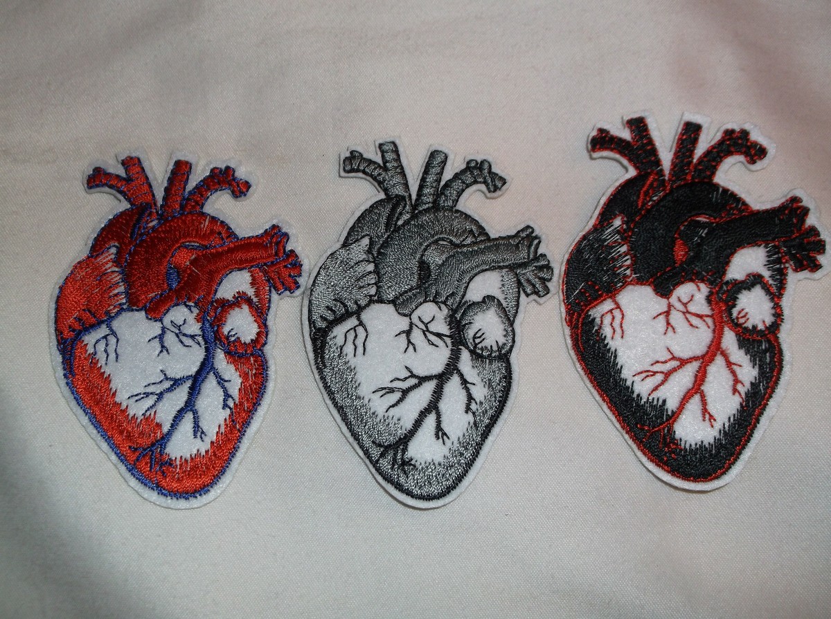 Two Human Hearts Stitched Together