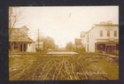 REAL PHOTO SCAMMON KANSAS DOWNTOWN DIRT STREET SCENE STORES POSTCARD ...